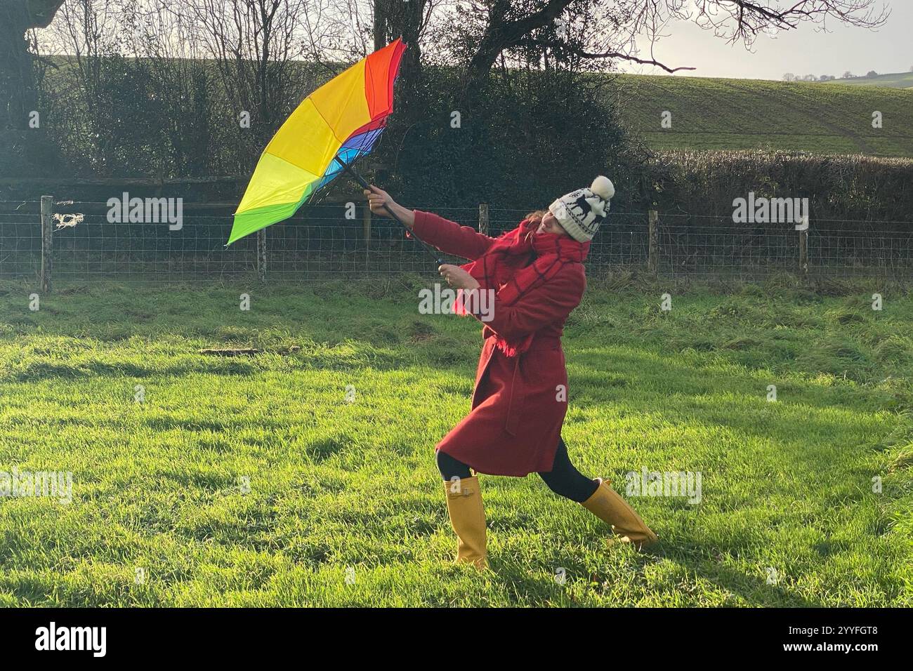 Battling with brolly hi-res stock photography and images - Alamy