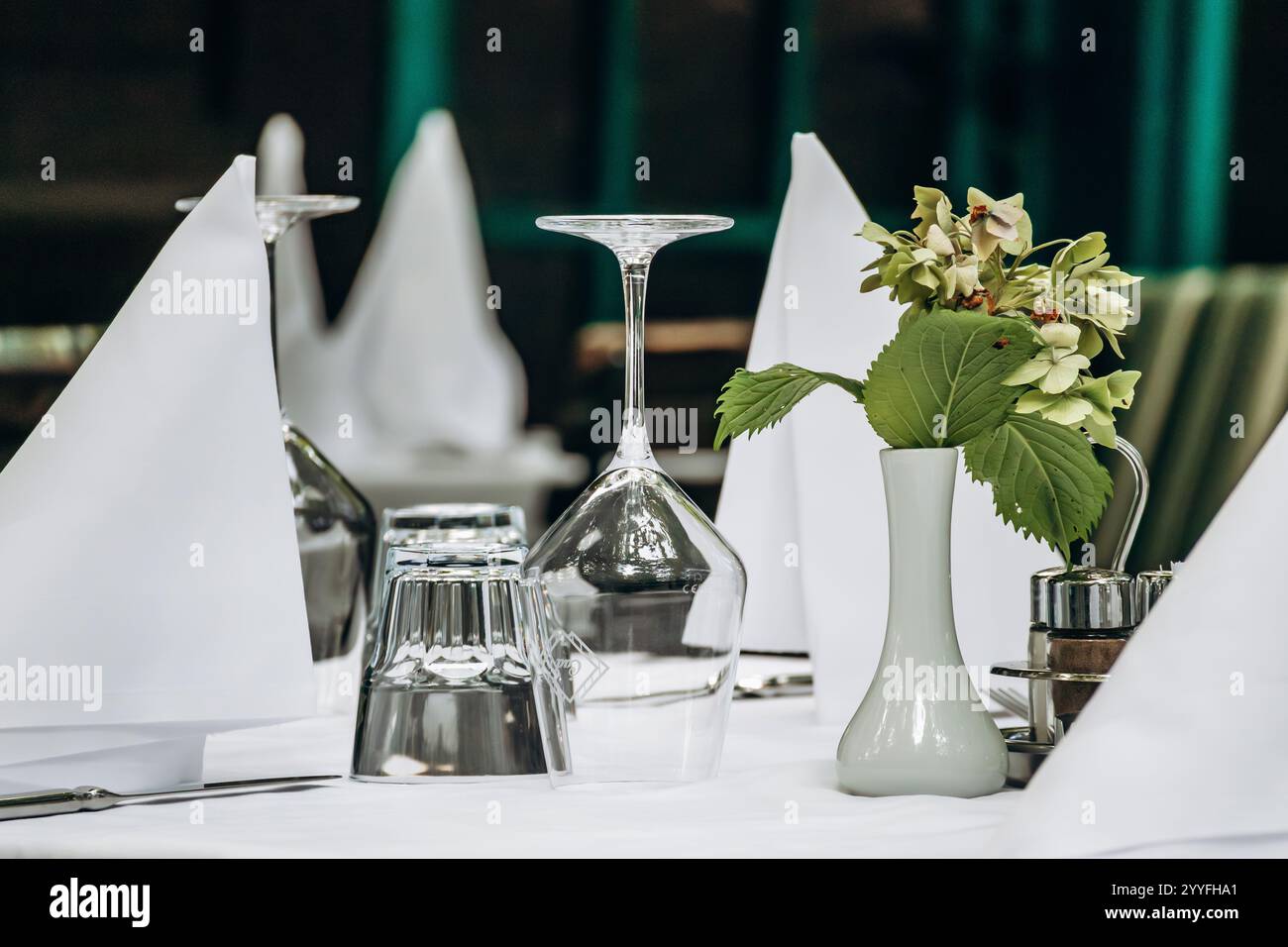 Elegantly Set Table with a White Tablecloth in a Restaurant Stock Photo ...