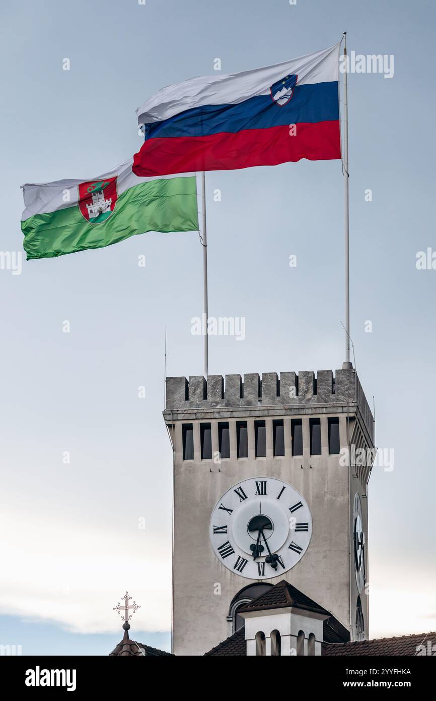 Flag of Slovenia and City of Ljubljana waving over the Ljubljana castle ...