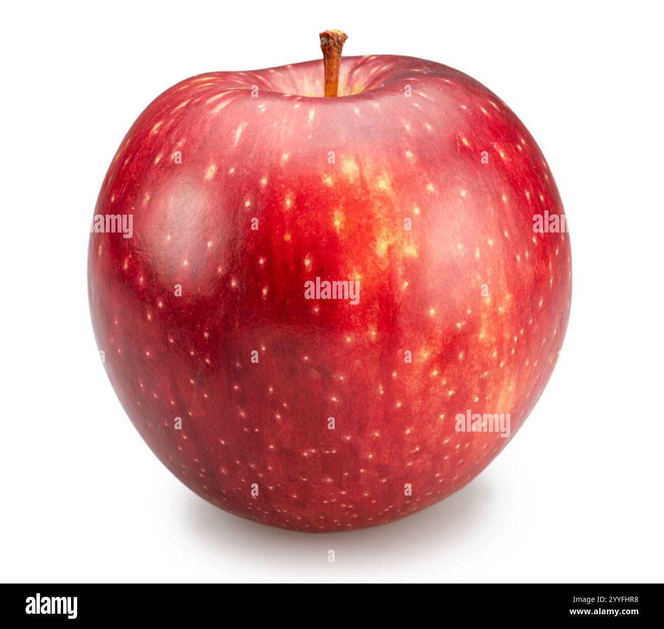 Ripe red apple with yellow spots on white background. File contains ...