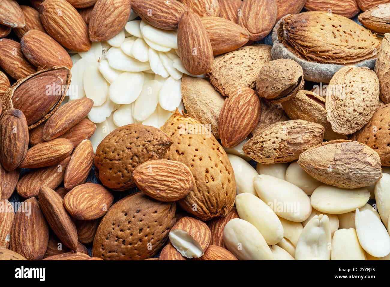 Large group of different almond nuts close-up. Food background Stock ...