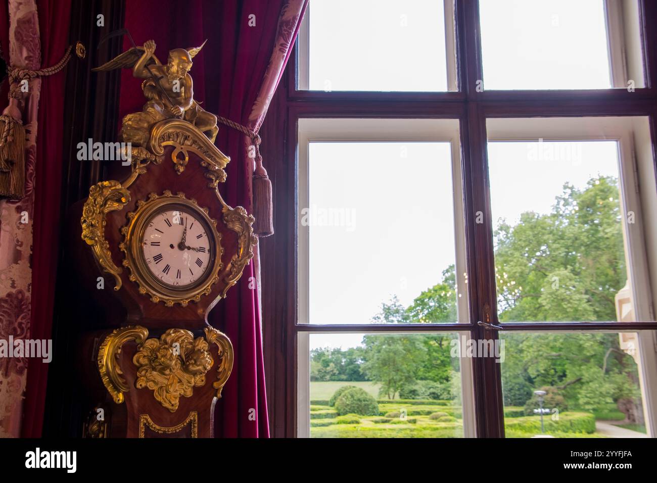 Old fashioned clock in the Chateau of Wenckheim Stock Photo - Alamy