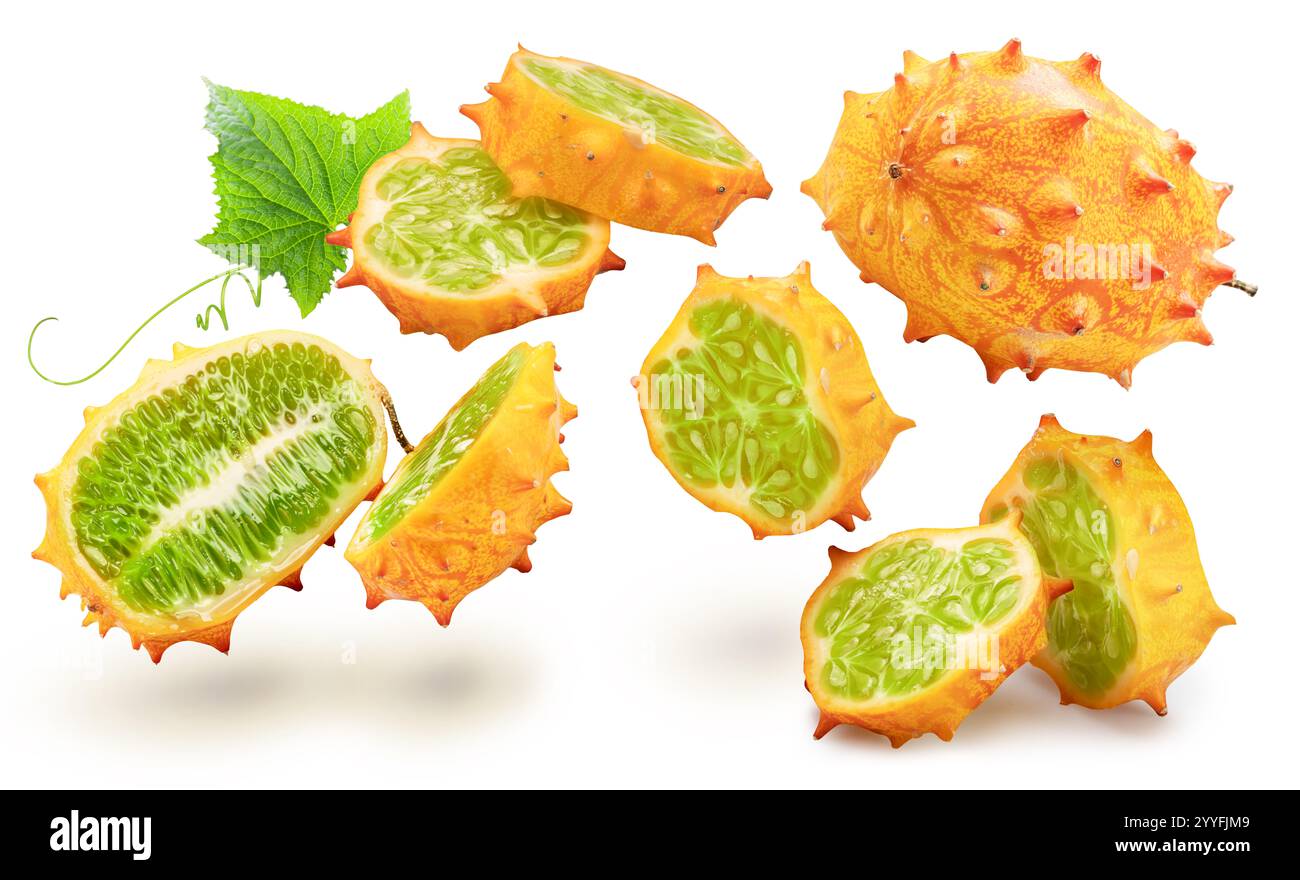 Kiwano fruit with kiwano slices levitating in air on white background. File contains clipping ...