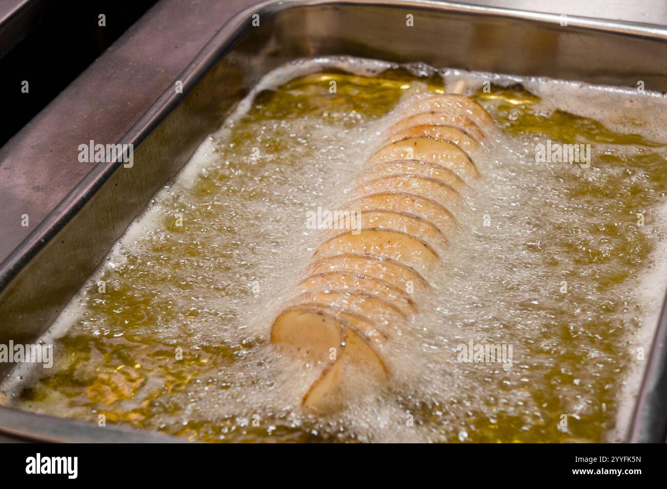 Deep frying cooking process hi-res stock photography and images - Alamy