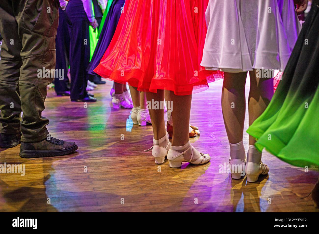 girls in ballroom dancing shoes and beautiful dresses at a ballroom ...