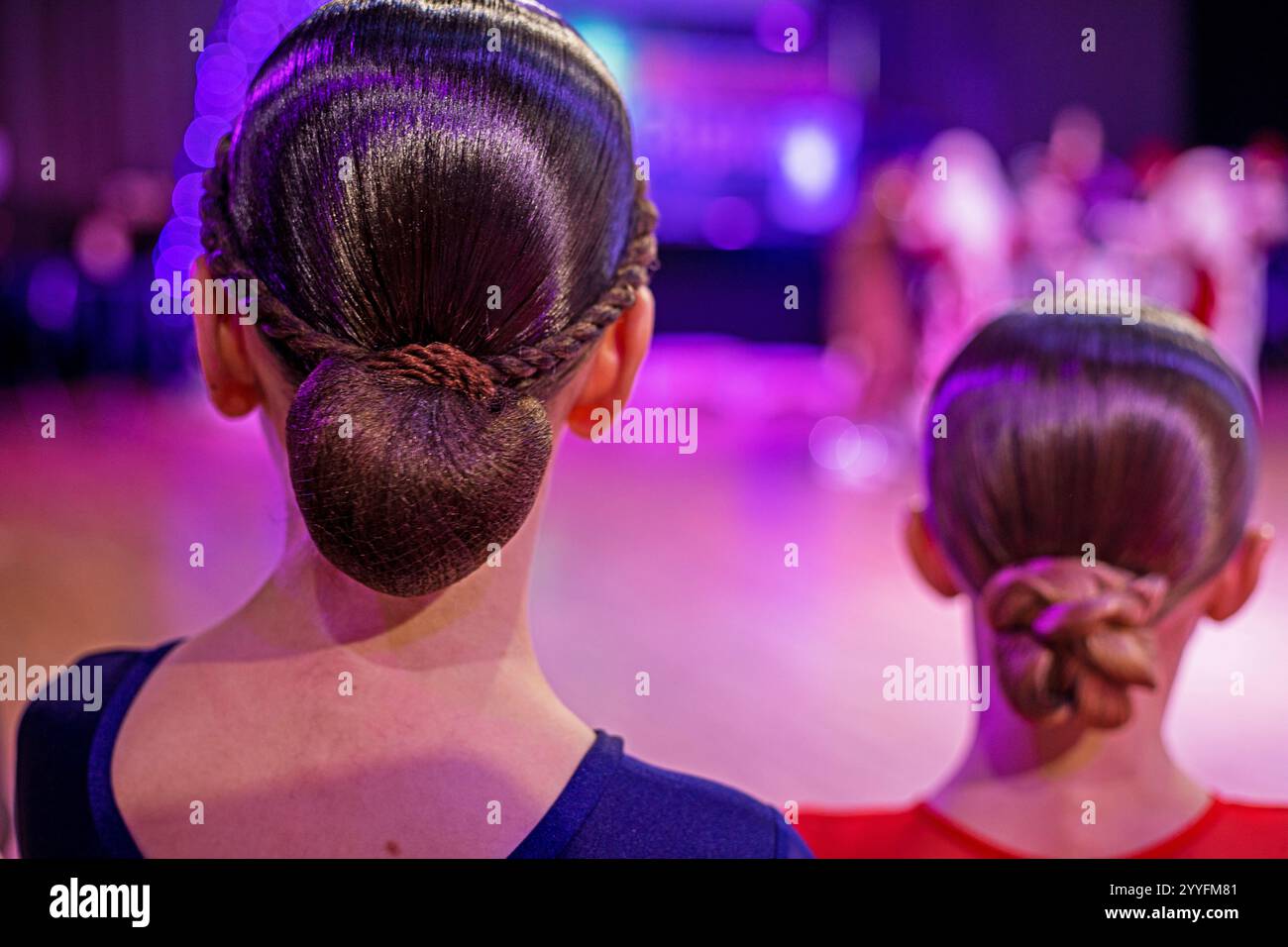 beautiful slicked-back hairstyles with buns at the bottom of girls ...
