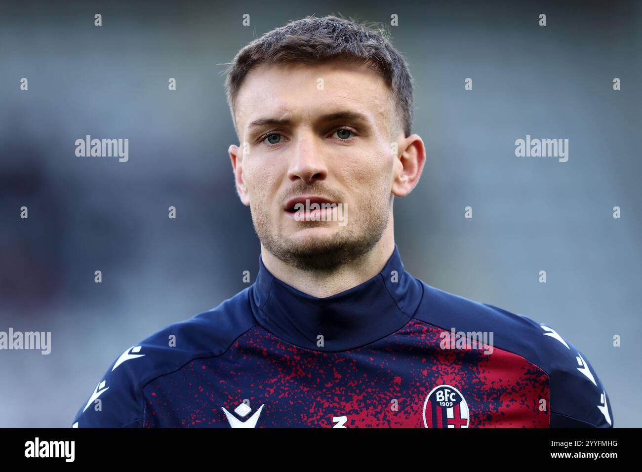 Torino, Italy. 21st Dec, 2024. Stefan Posch of Bologna Fc looks on ...
