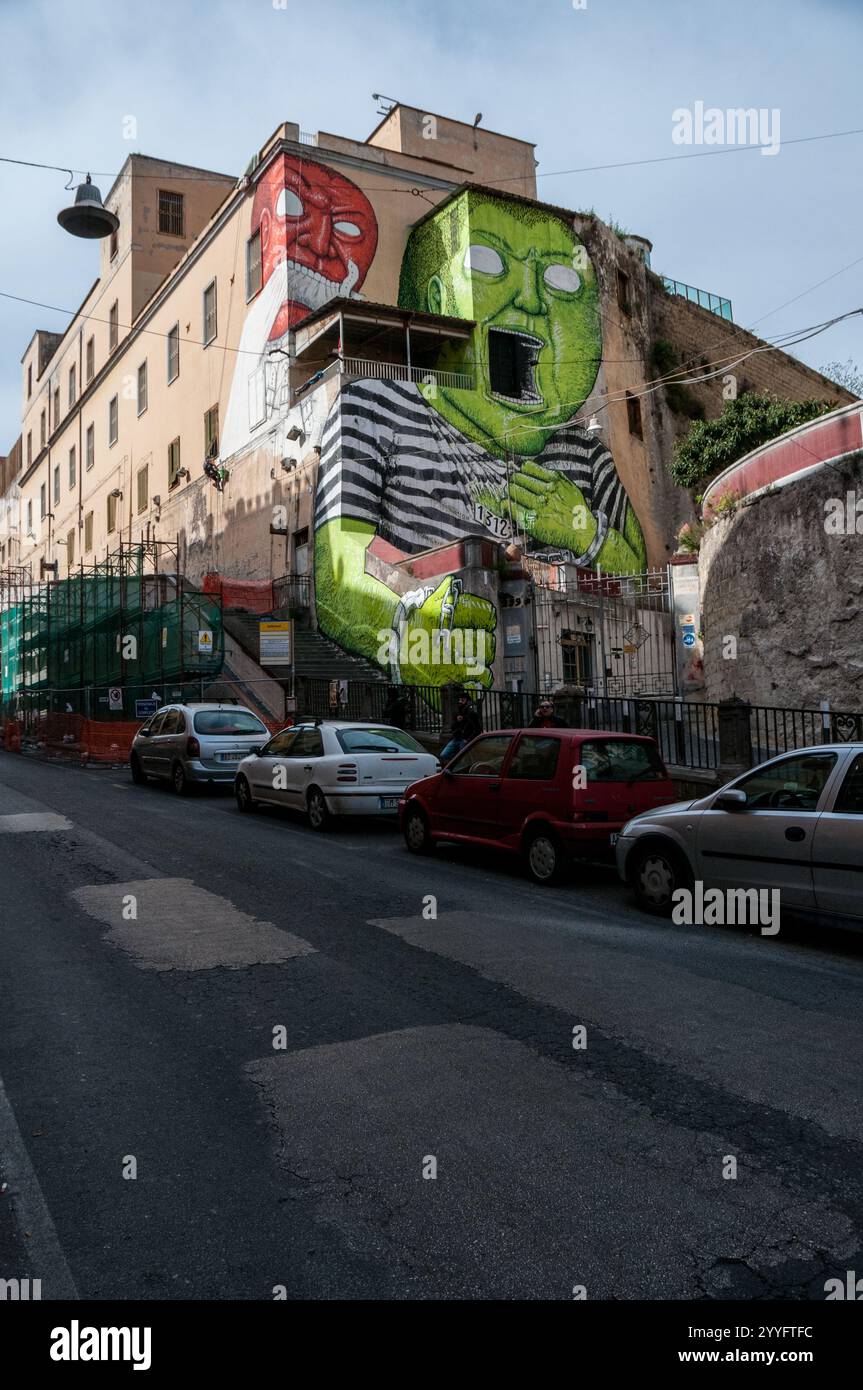 Street art by the famous artist Blu drawn live on the facade of the ...