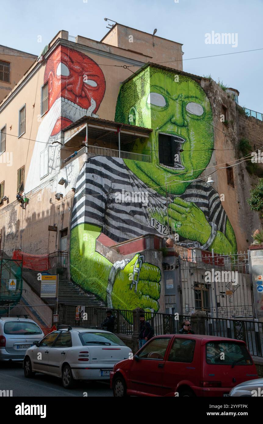 Street art by the famous artist Blu drawn live on the facade of the ...