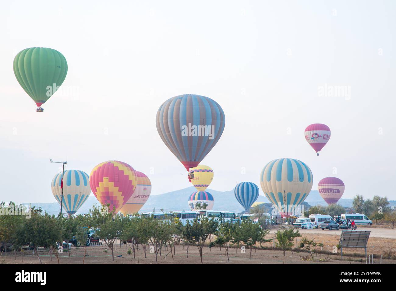 Balloons at dawn in the landscape of cappadocia. High quality photo ...