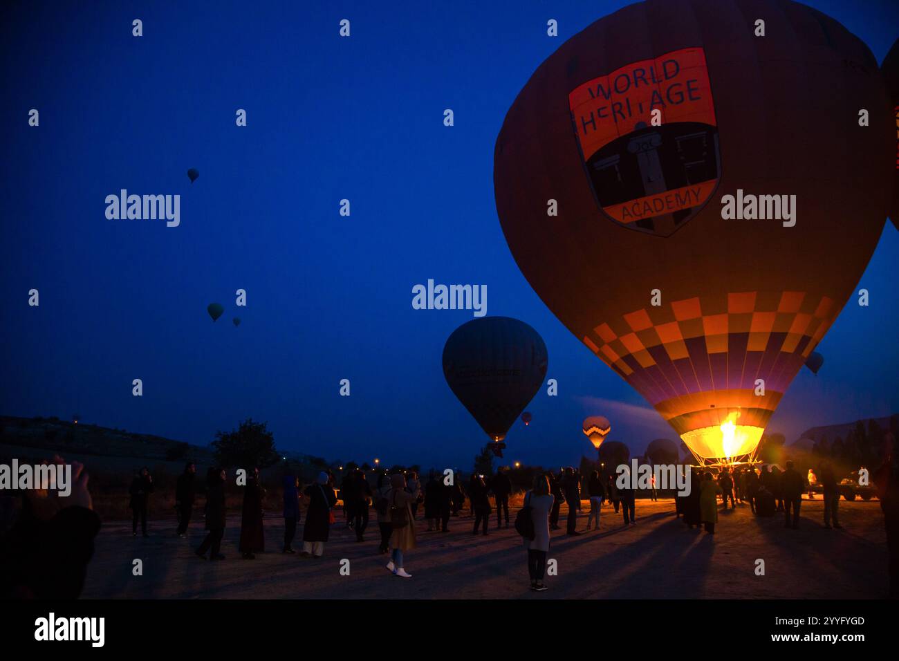 Balloons at dawn in the landscape of cappadocia. High quality photo ...