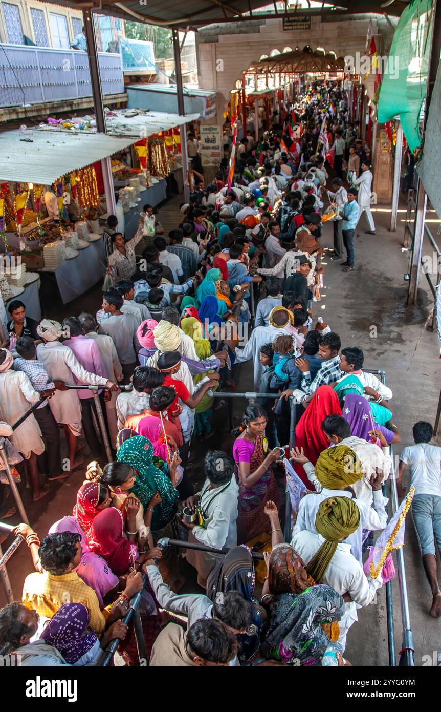 Queues of devotees at the Ramdevra fair, Ramdevra, Rajasthan, India ...