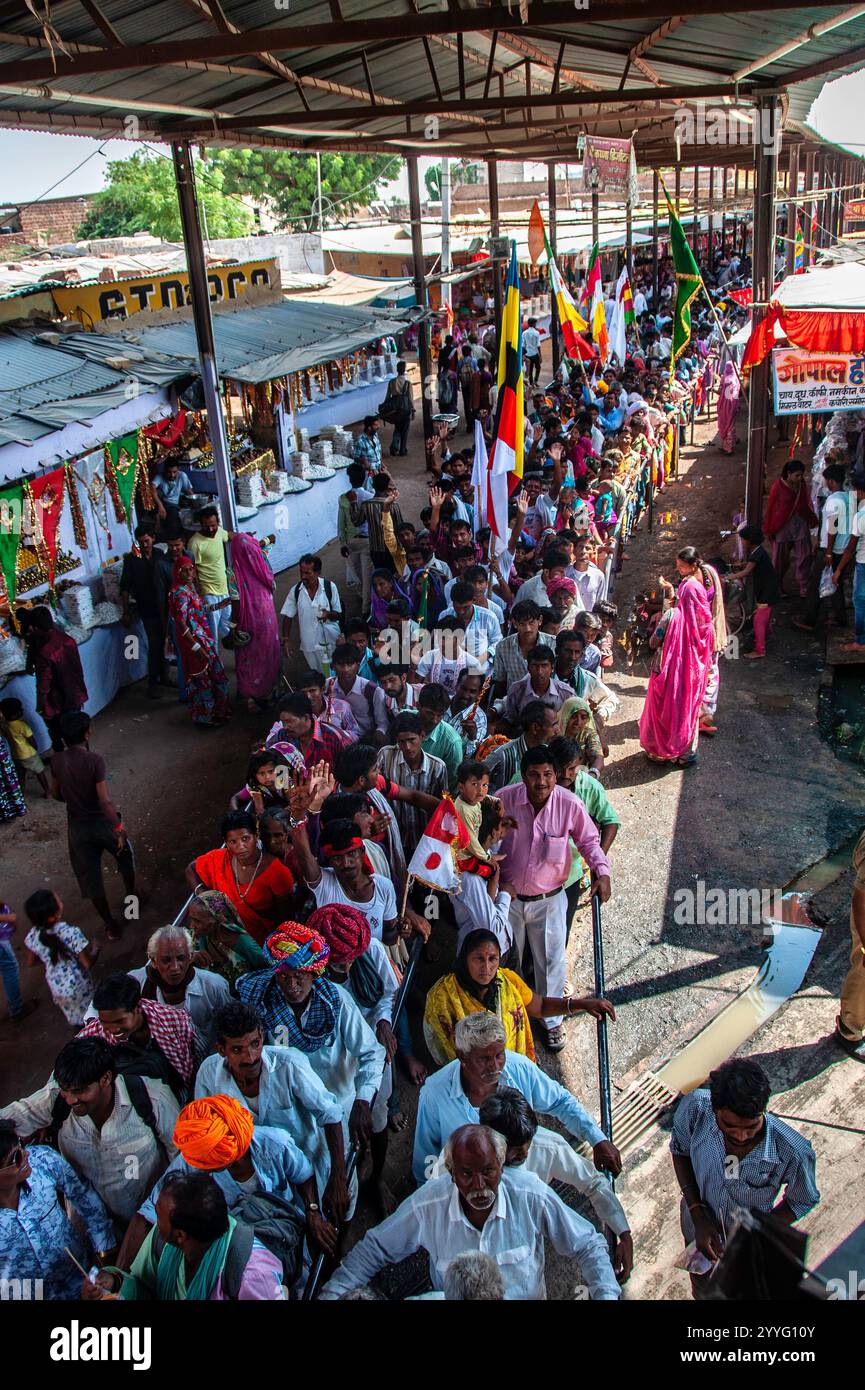 Queues of devotees at the Ramdevra fair, Ramdevra, Rajasthan, India ...