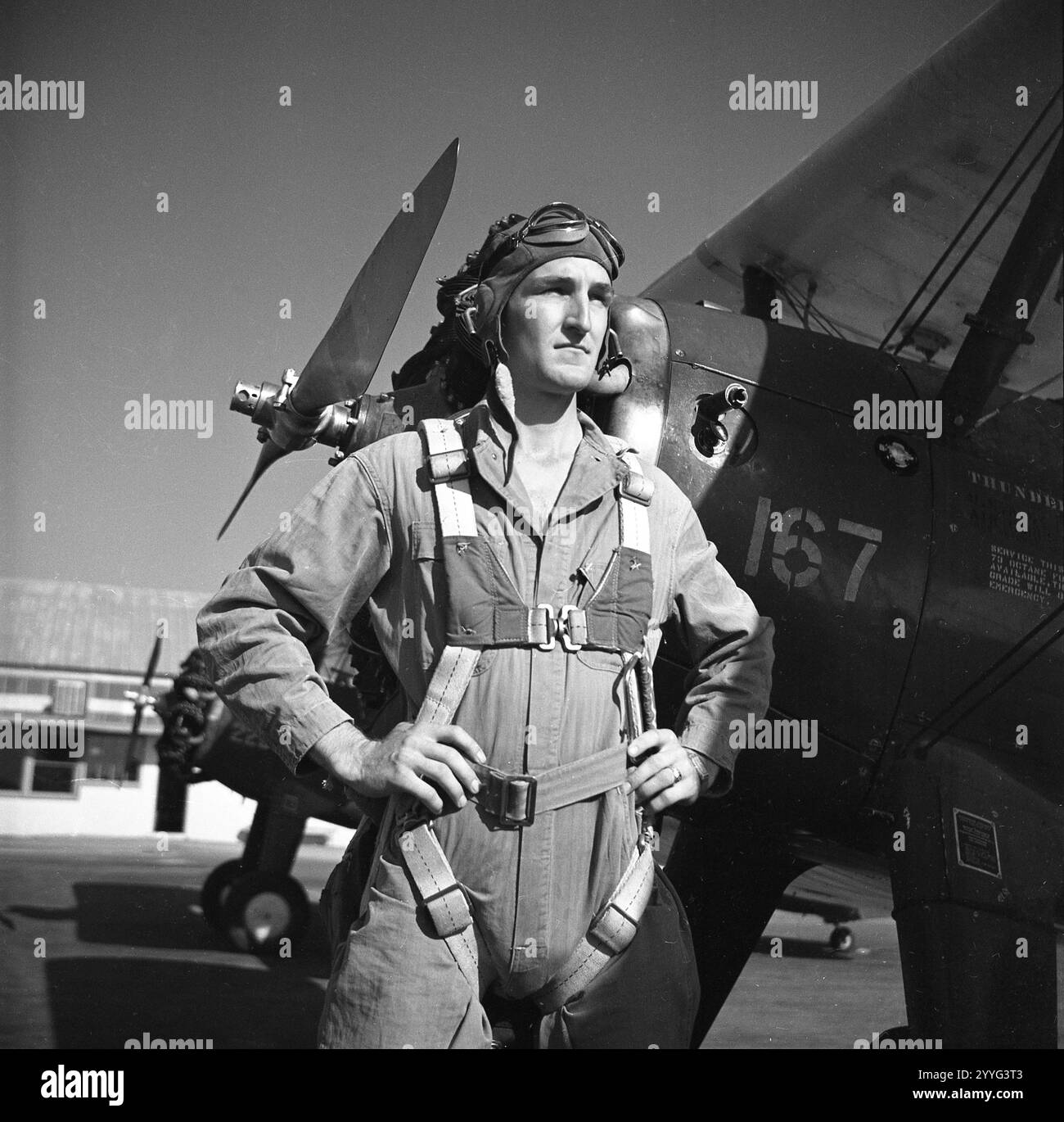 World War 2 pilot - Army aviator posing next to biplane. September ...