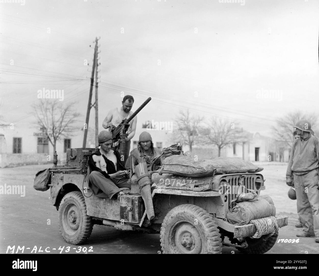 World War 2 soldiers – L-R Pfc. Philip L. Mahoney, driver, and T-5 R. R ...