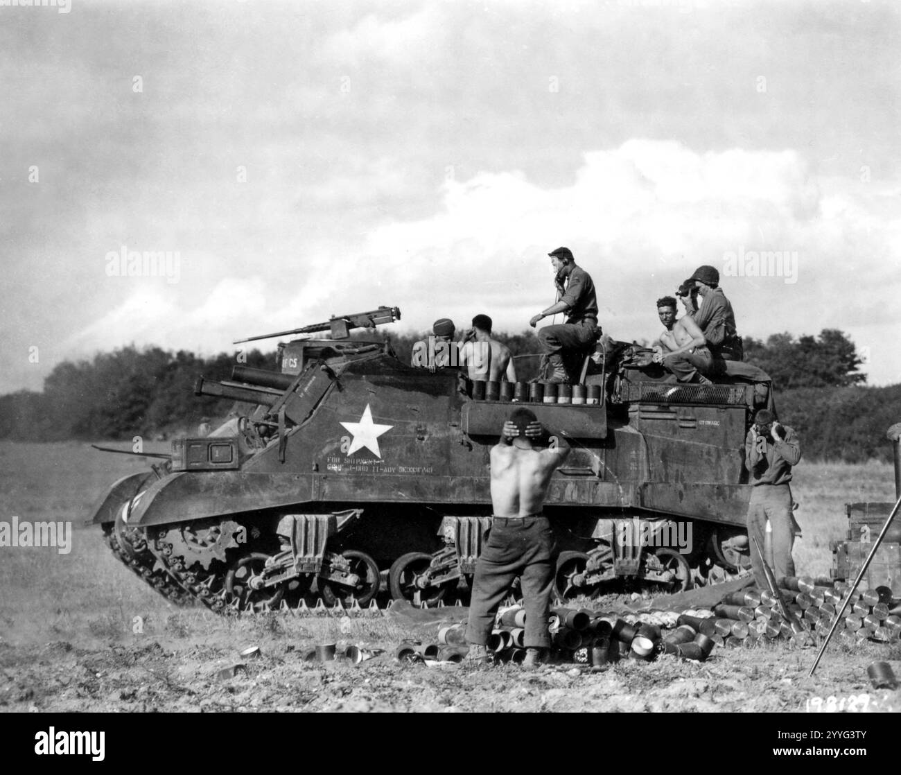 An M7 crew lets go with its 105 howitzer near Anet, France, its crew ...