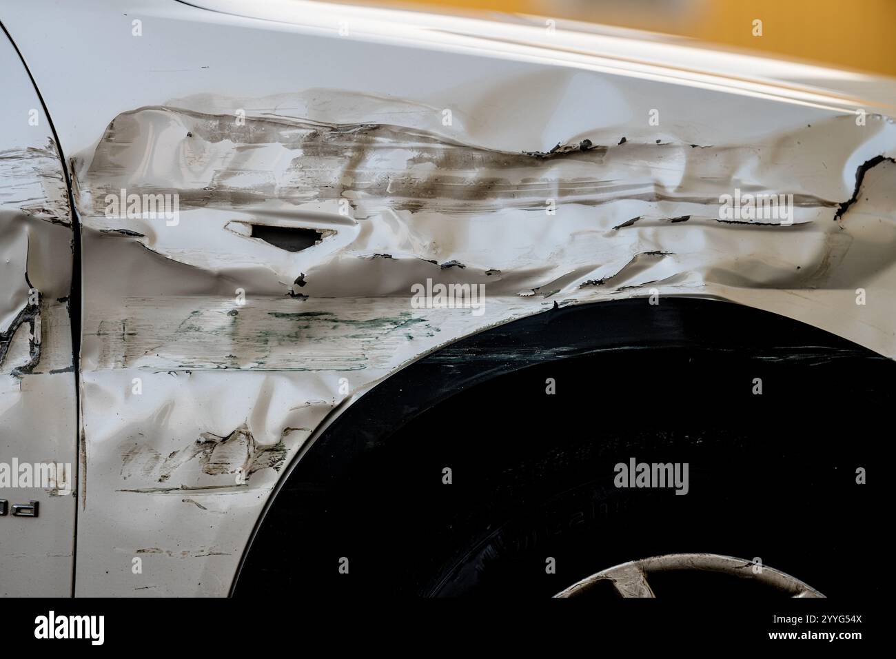 Badly crashed side of a white car Stock Photo - Alamy