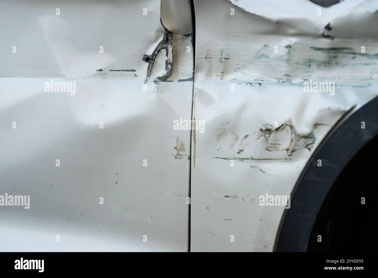 Badly crashed side of a white car Stock Photo - Alamy