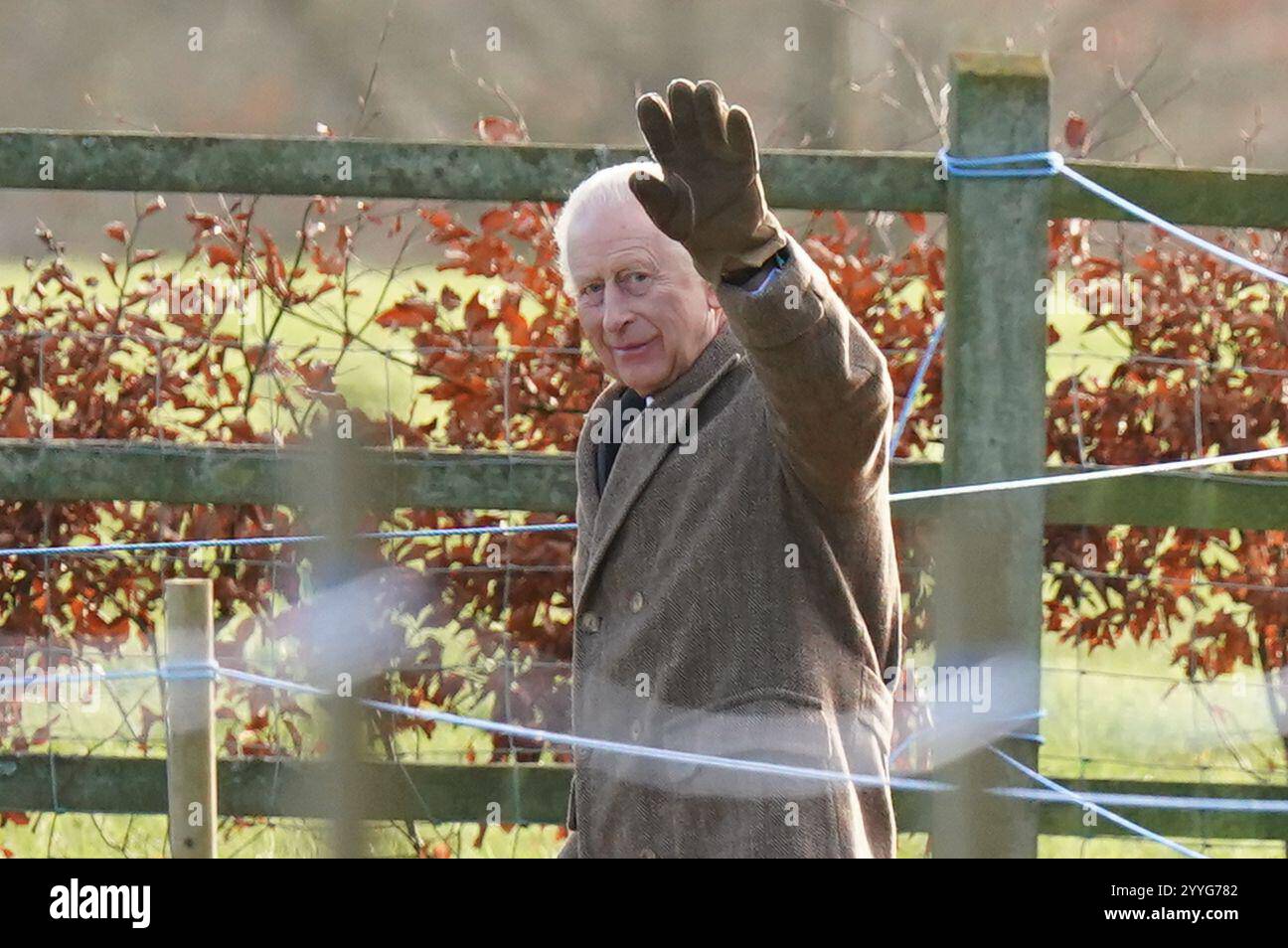 King Charles III waves to well wishers as he leaves following a Sunday ...