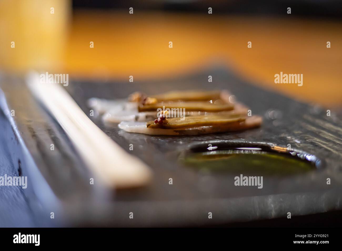 Close up Thai Fish sashimi with olive oil on the dish Stock Photo - Alamy
