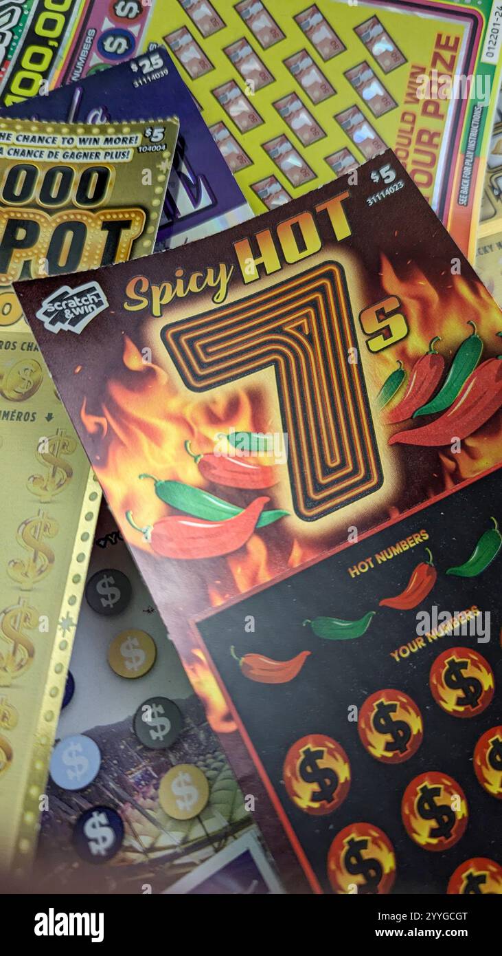Scratch-off lottery tickets at a table Stock Photo - Alamy