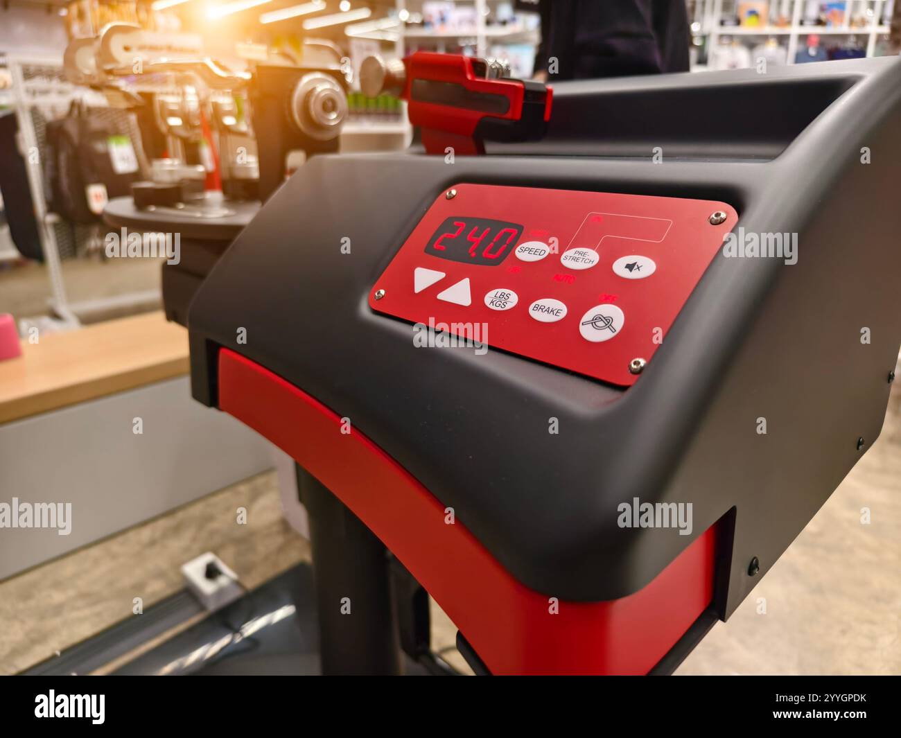 Strings a badminton racket on a racket stringing machine Stock Photo ...