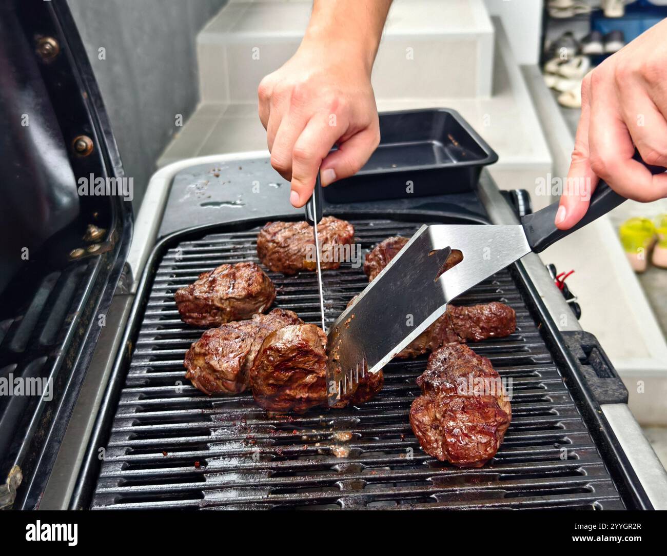 Sizzling grilled meat that showcases a perfect char Stock Photo - Alamy