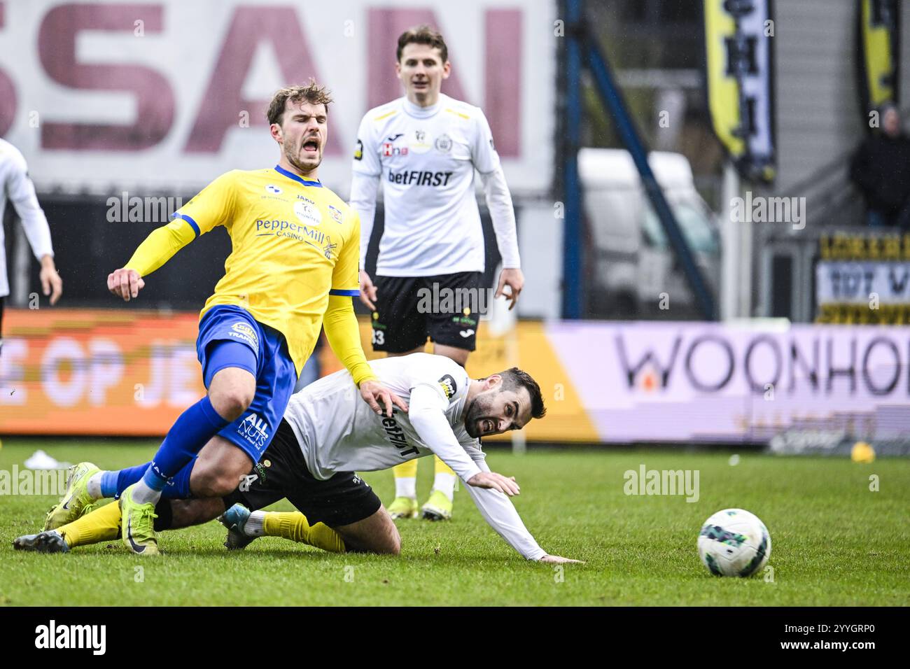 Lokeren, Belgium. 22nd Dec, 2024. Beveren's Lennart Mertens and Lokeren ...