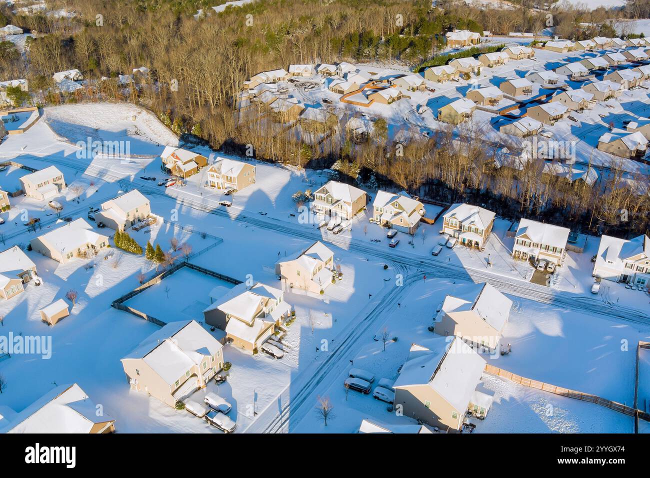 Winter American suburbs aerial view reveals suburban areas covered in ...