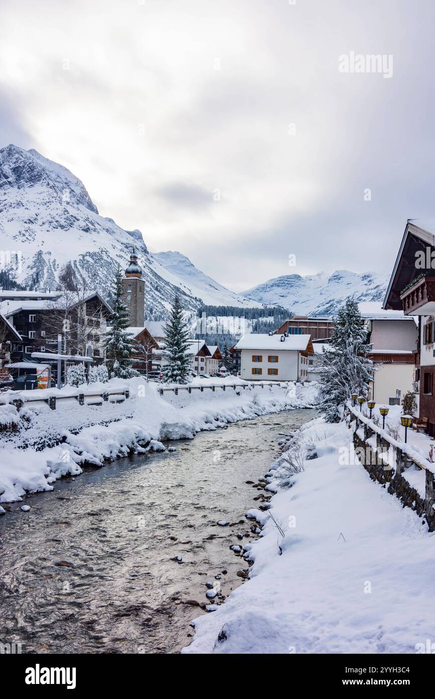 winter in Lech, river Lech, church Lech Lech Arlberg Vorarlberg Austria ...