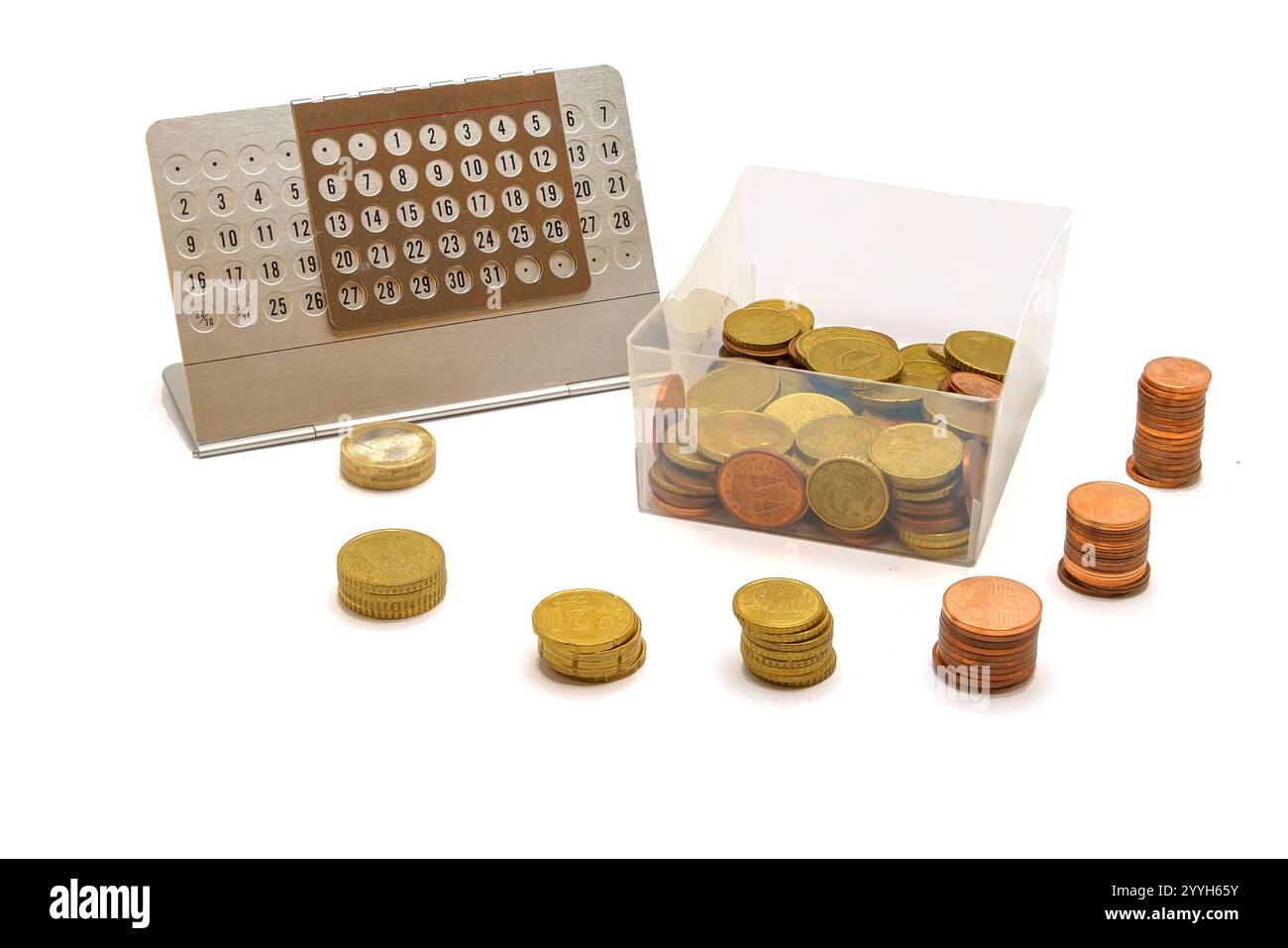 Euro Coins with Desk Calendar on White Background Stock Photo - Alamy