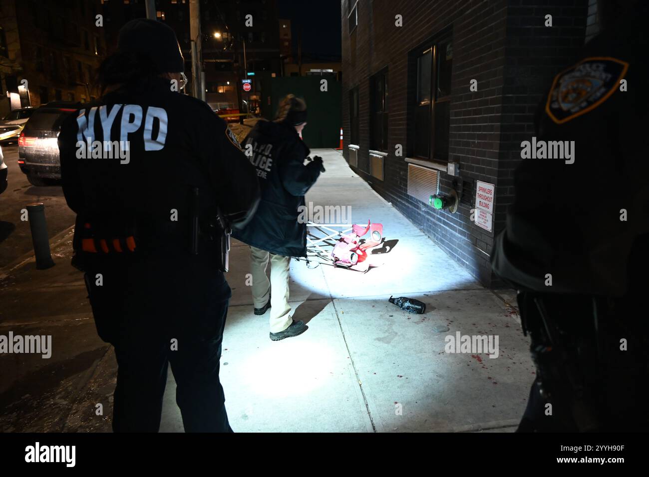 NYPD crime scene investigators find a chair, blood and other objects ...