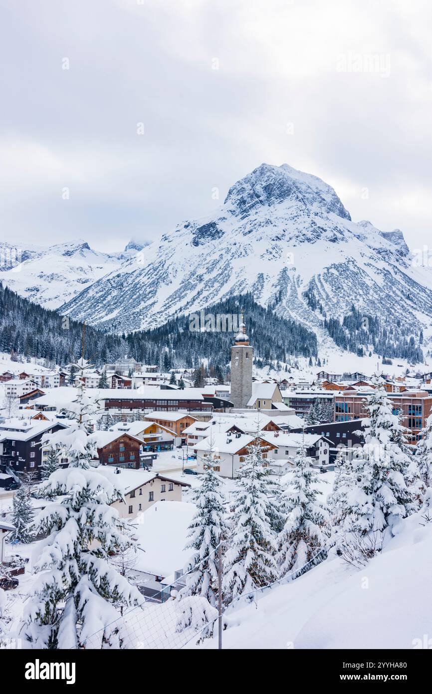 Lech: winter in Lech, church Lech, mountain Omeshorn in Arlberg ...