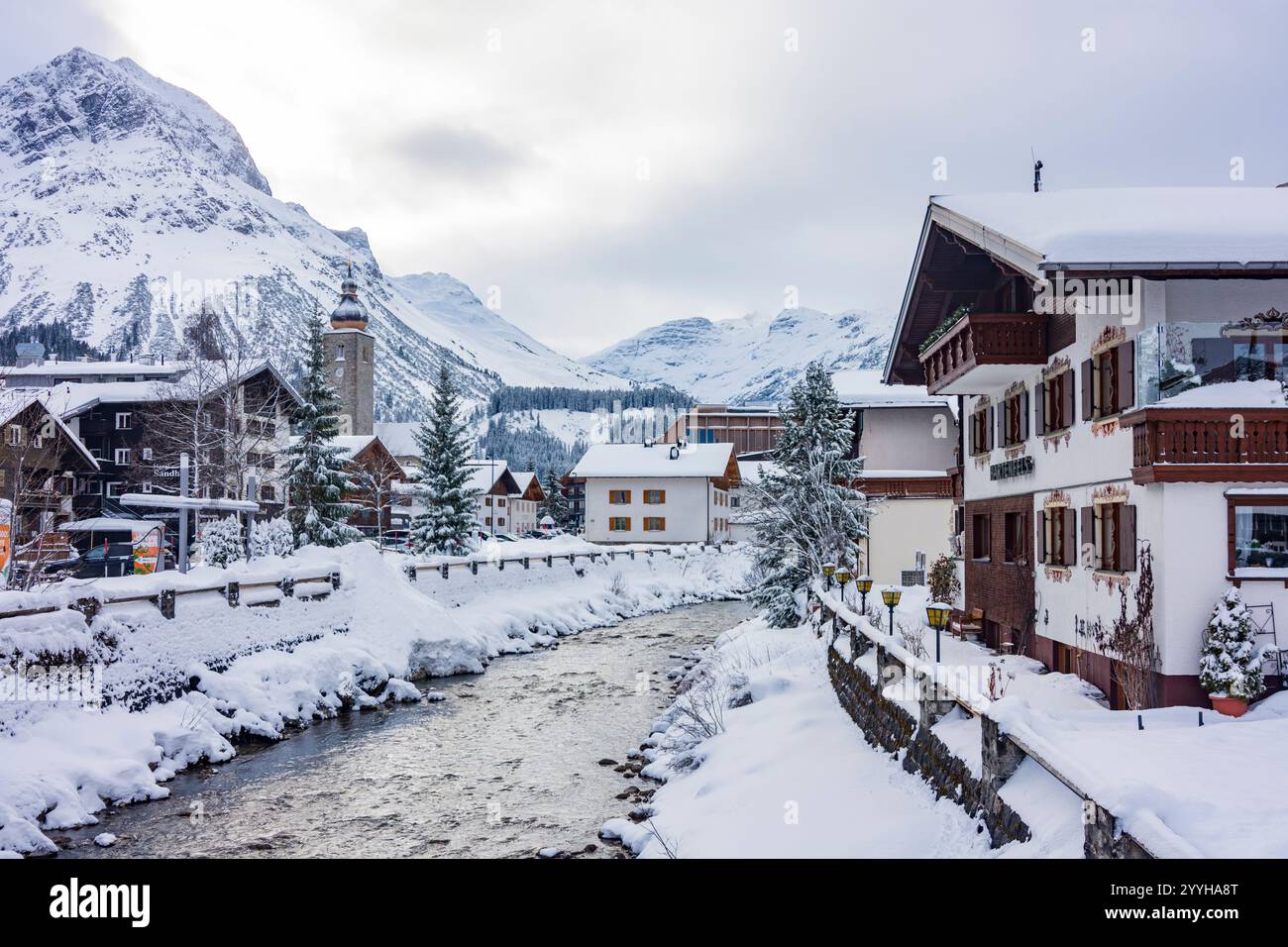 Lech: winter in Lech, river Lech, church Lech in Arlberg, Vorarlberg ...