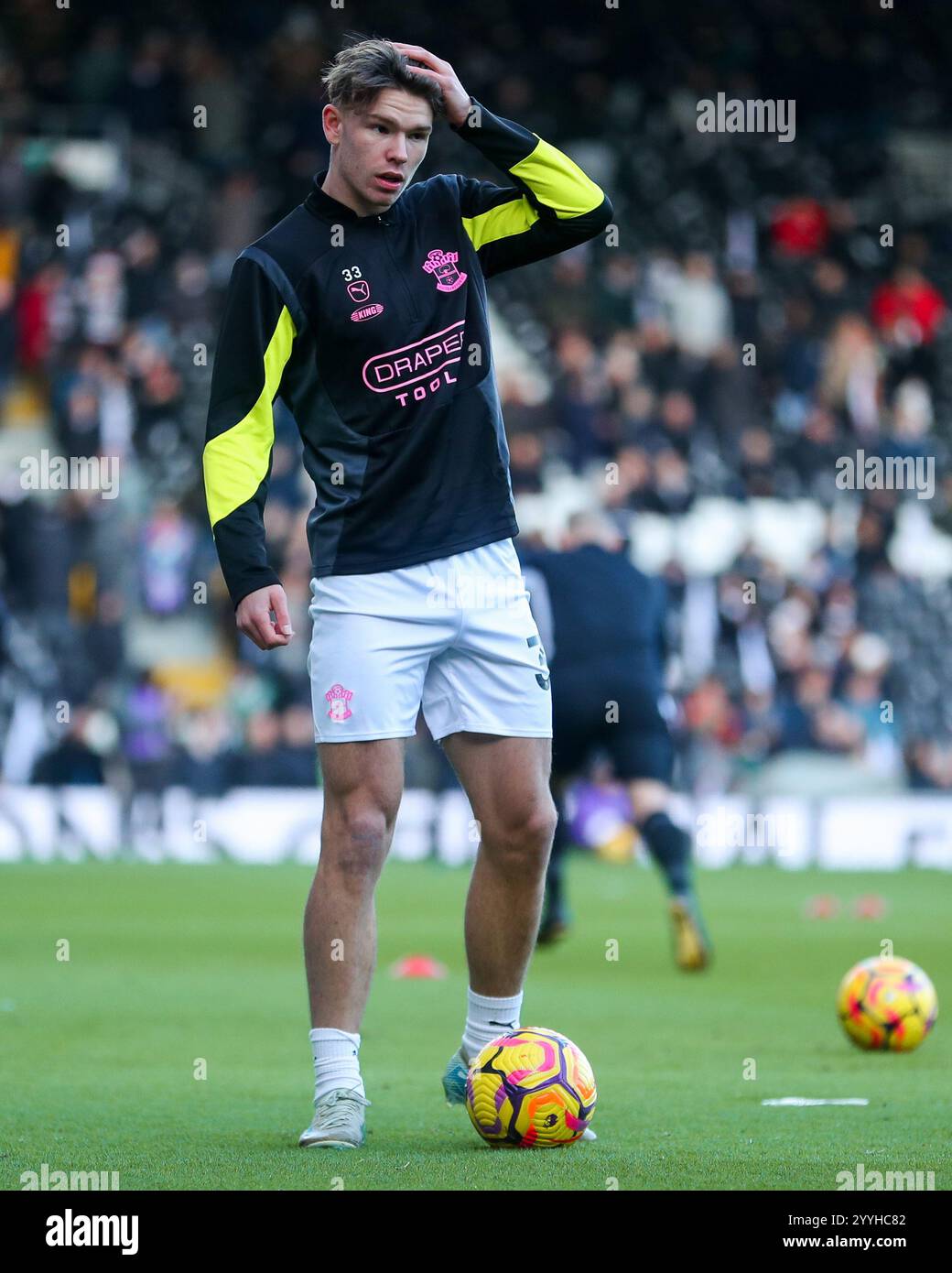 Tyler Dibling of Southampton warms up prior to the Premier League match ...