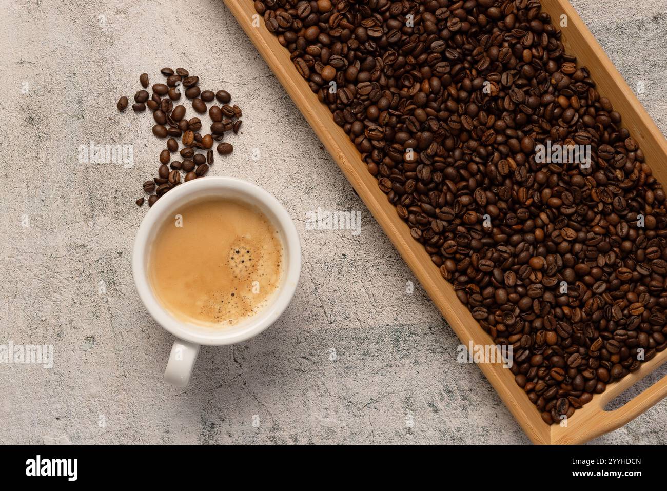An overhead view of a black americano coffee with a rich crema layer ...