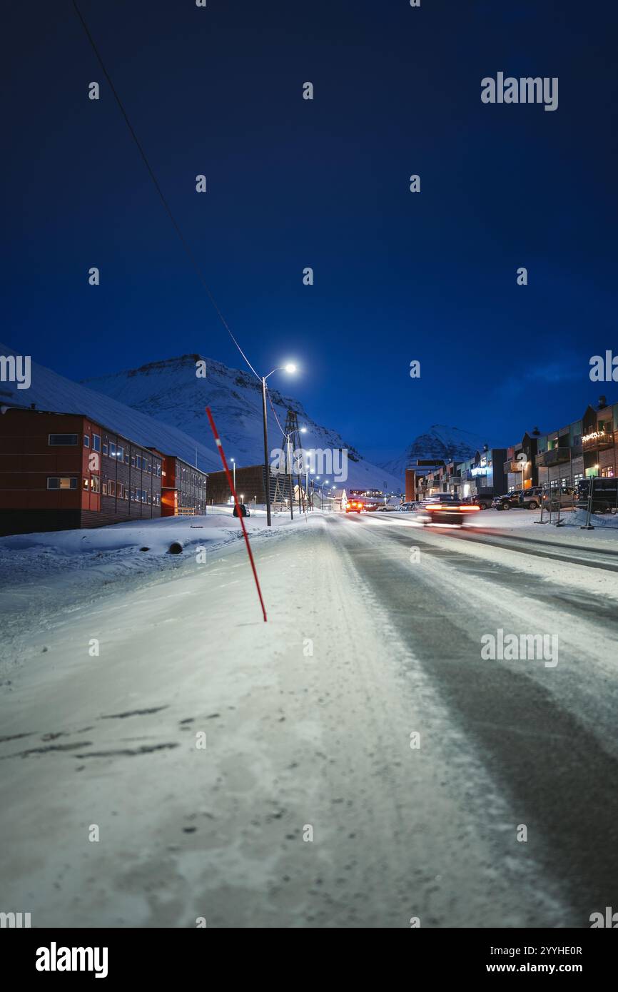 Main Longyearbyen, Svalbard road in town center in the polar night ...