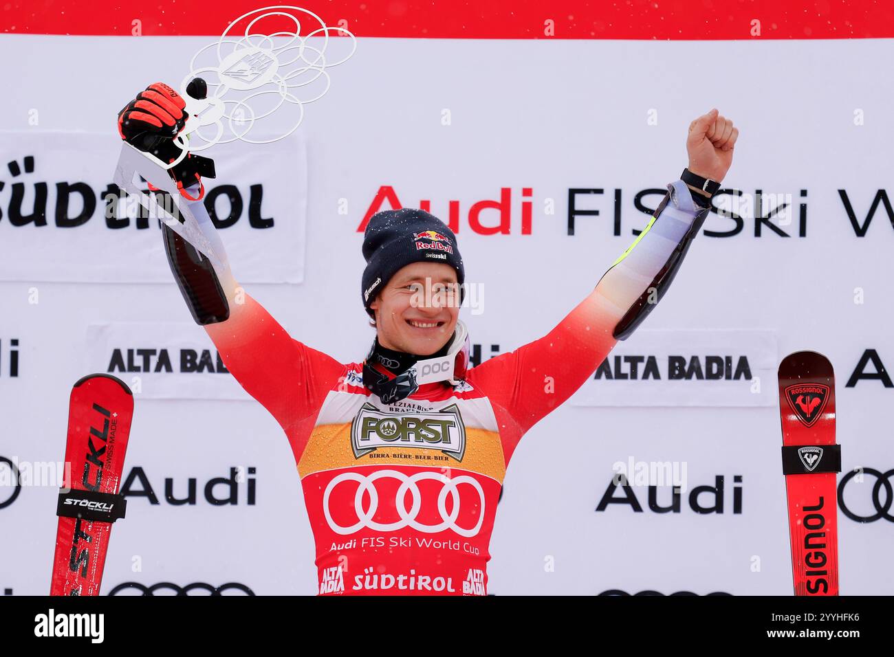 Switzerland's Marco Odermatt celebrates on the podium after winning an ...