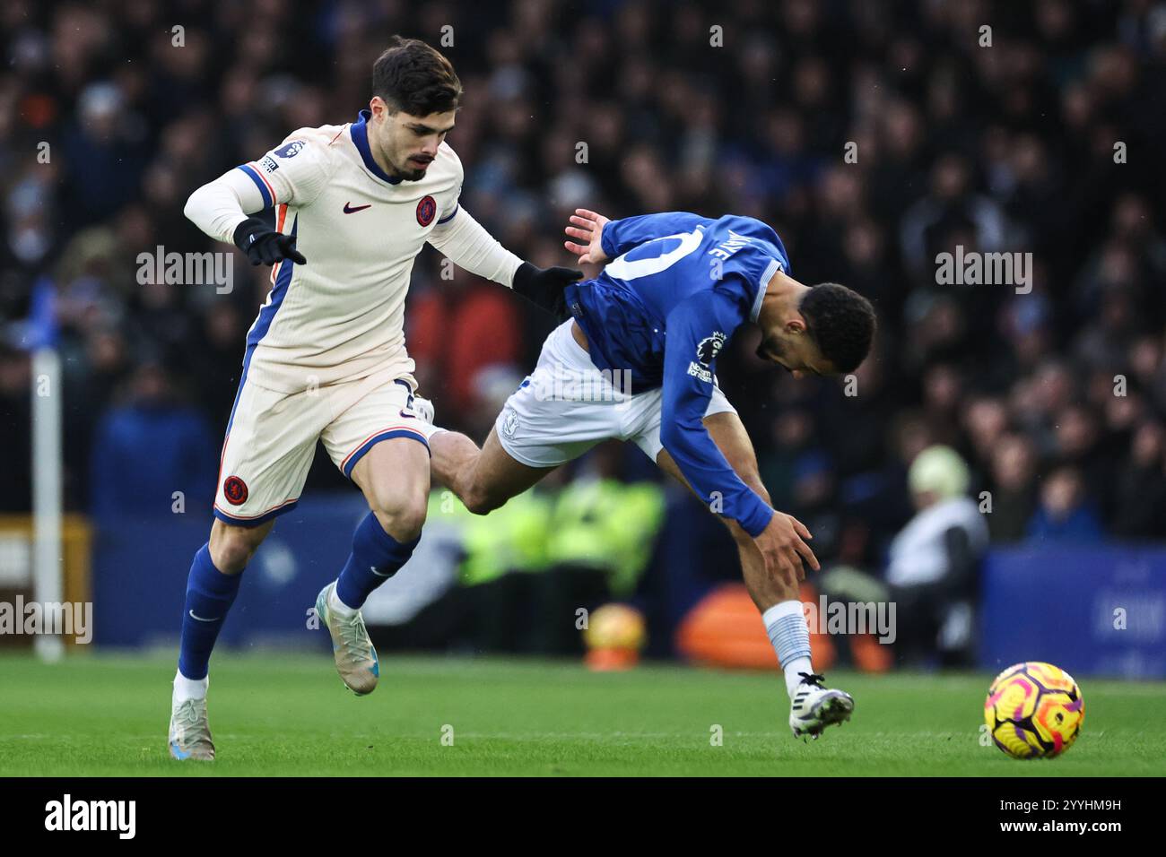 Pedro Neto of Chelsea fouls Iliman Ndiaye of Everton during the Premier ...