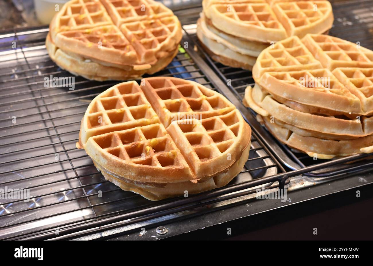 Fluffy and delicious honeycomb street pancake. Street food at night ...