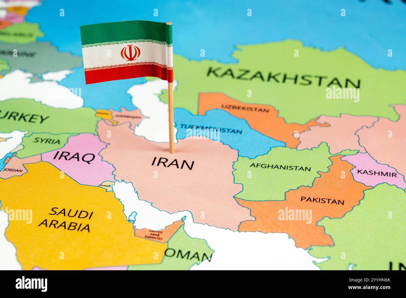 A map of Iran with the national flag of Iran on it. The flag is green ...
