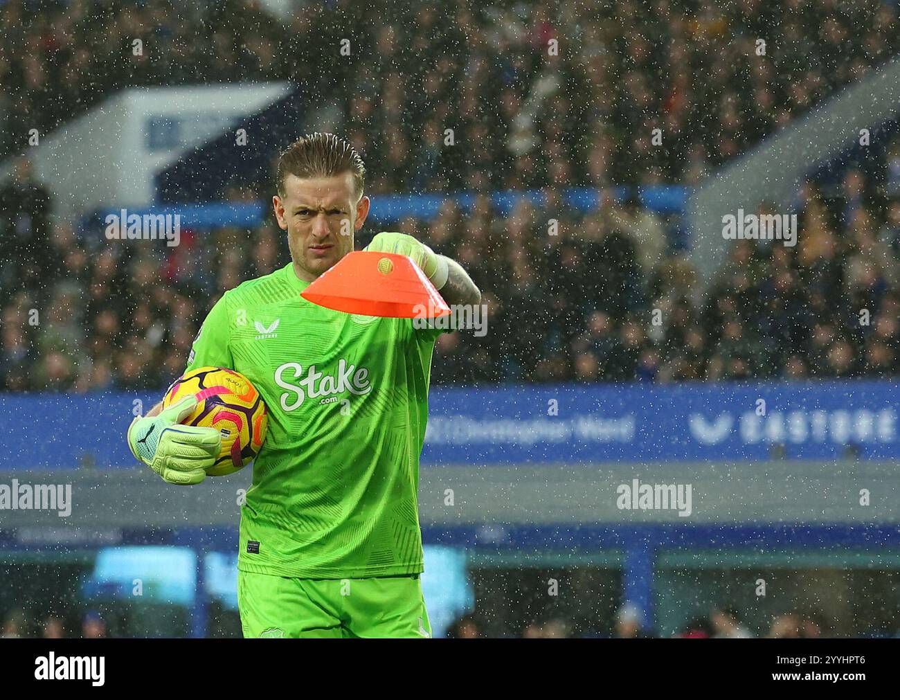 Liverpool, UK. 22nd Dec, 2024. Jordan Pickford of Everton picks up a ...