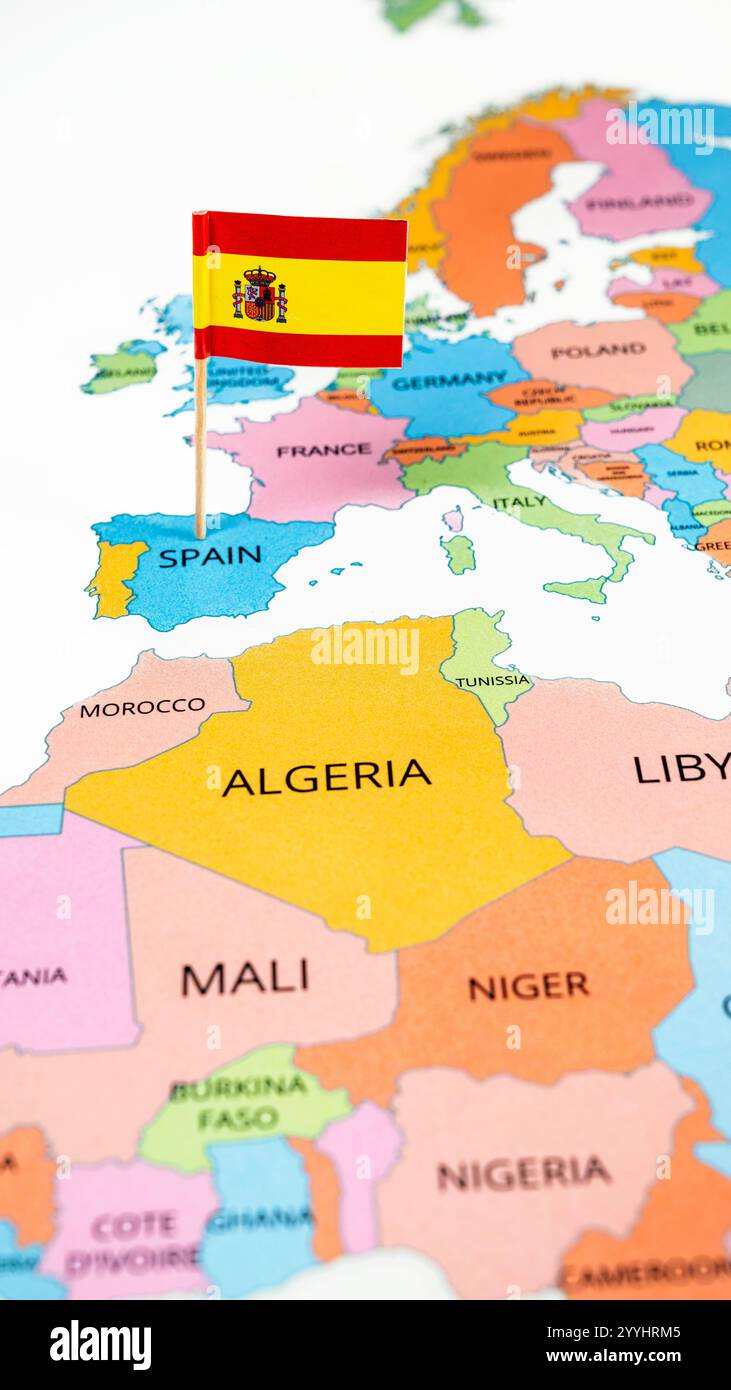 A map of Spain with the national flag of Spain on it. The flag consists ...