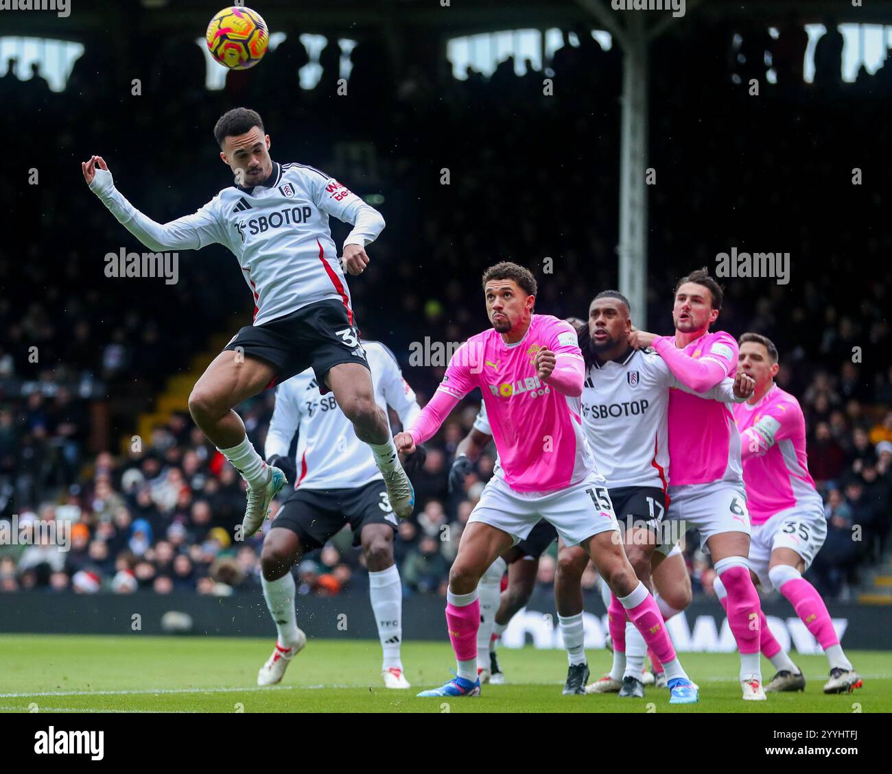 Antonee Robinson of Fulham heads the ball during the Premier League ...