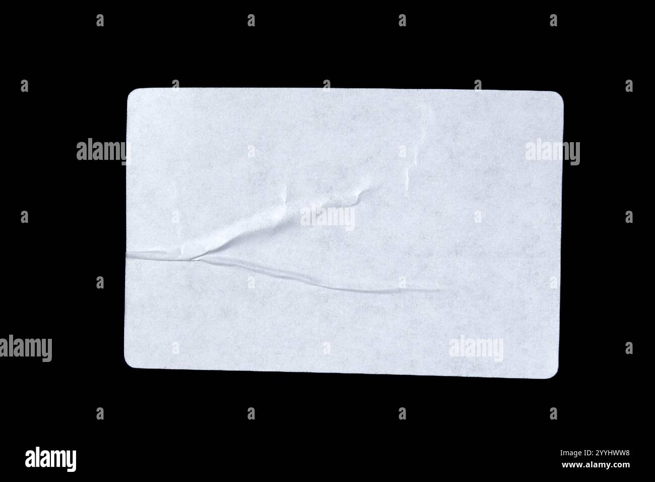 White adhesive glued creased paper sticker label isolated on black ...
