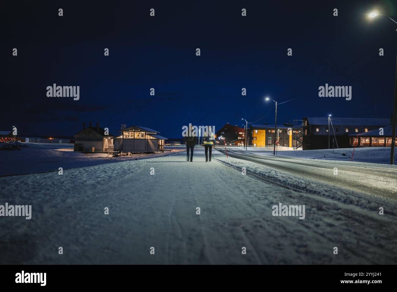 Winter Evening Walk: Longyearbyen Under the Night Sky Stock Photo - Alamy