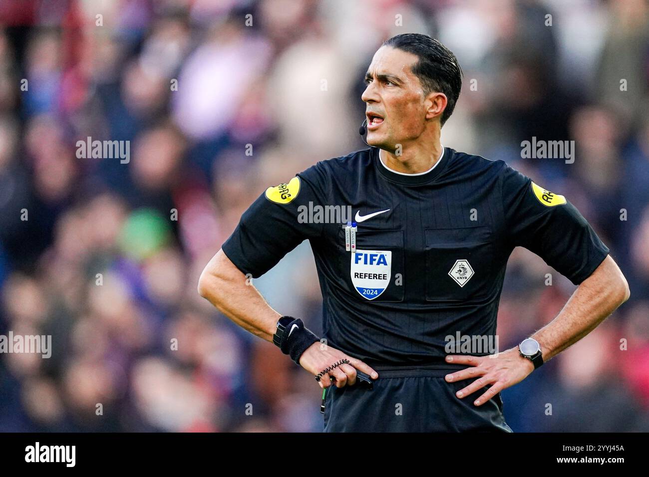 EINDHOVEN, NETHERLANDS - DECEMBER 22: Referee Serdar Gozubuyuk looks on ...