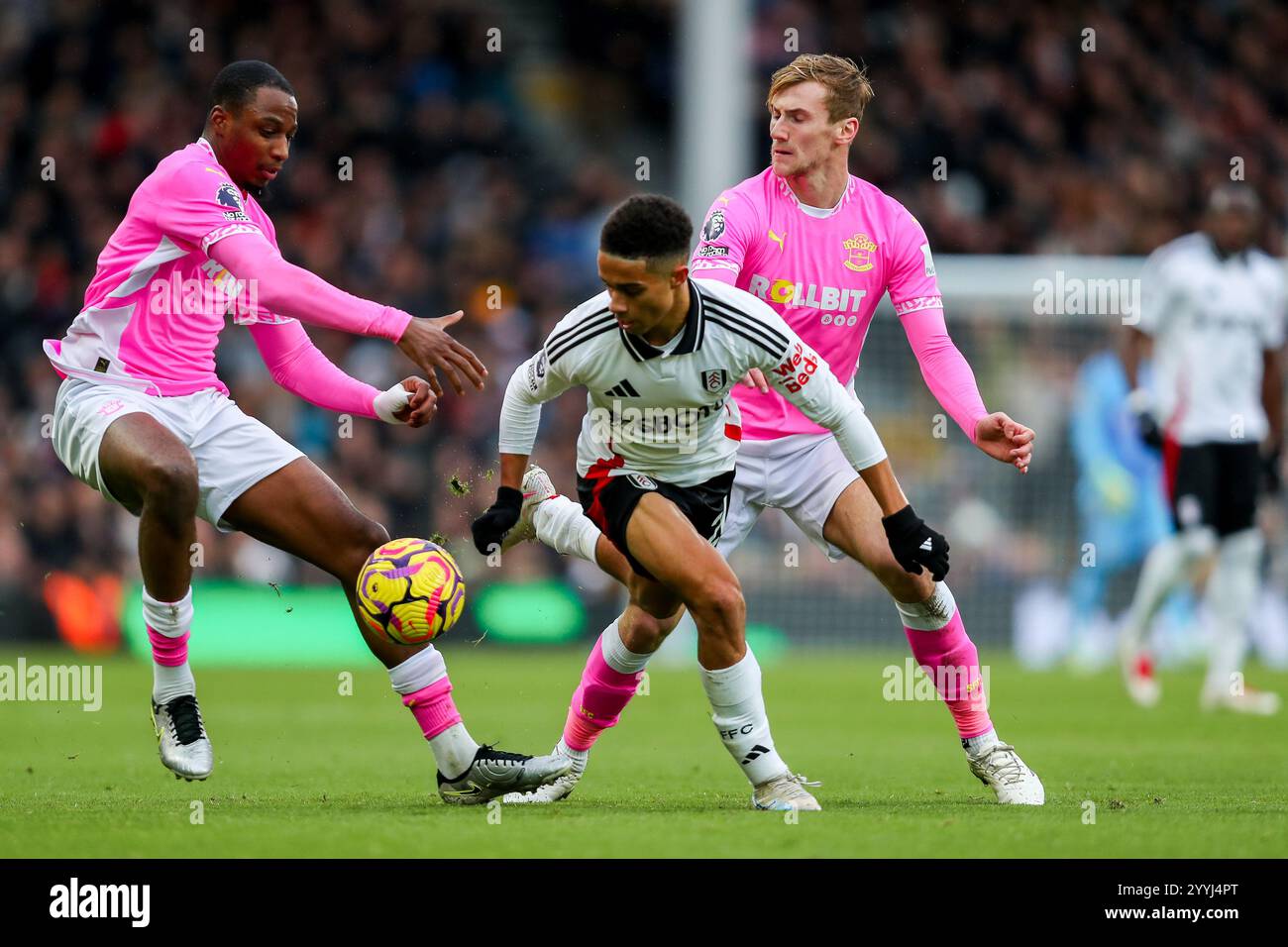 London, UK. 22nd Dec, 2024. Joshua King of Fulham is put under pressure ...