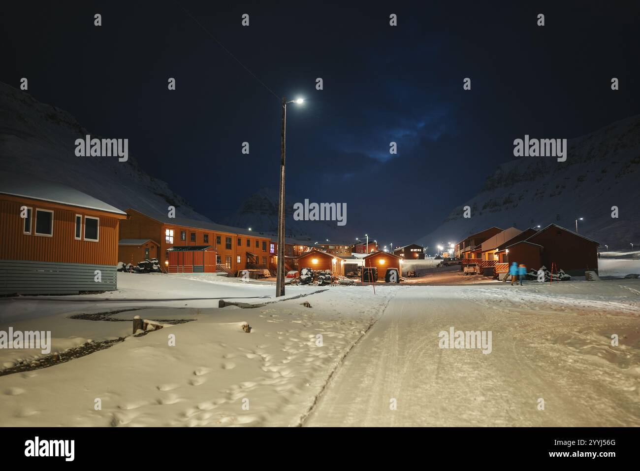 Snowy road through residential area in Longyearbyen, Svalbard polar ...