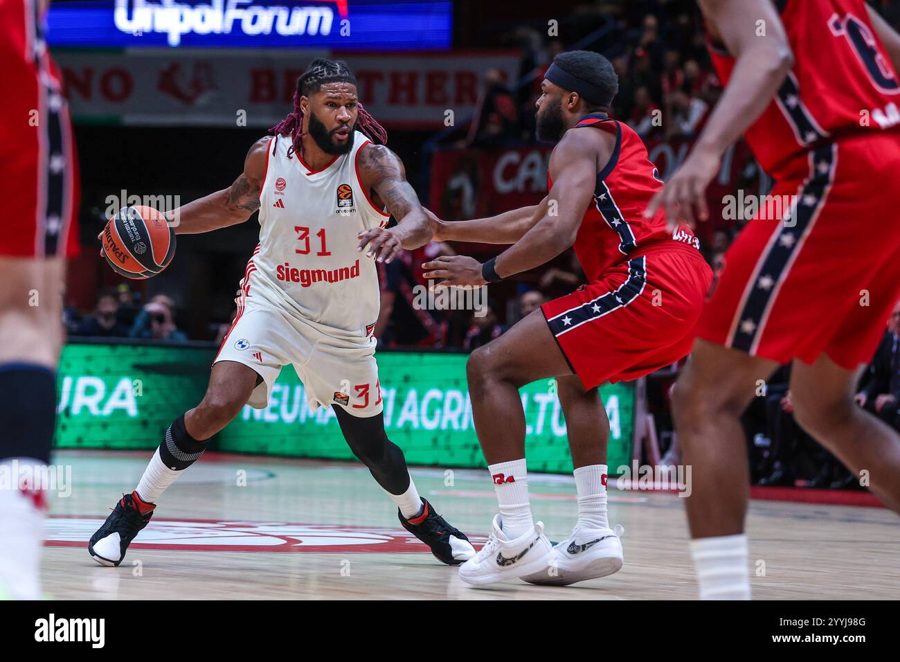 Milan, Italy. 20th Dec, 2024. (L-R) Devin Booker #31 of FC Bayern ...